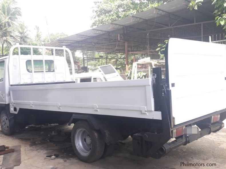 Used Isuzu ELF NPR Wide 14ft Dropside Cargo with Power tailgate lifter ...