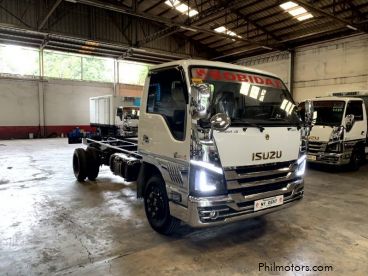 New Isuzu elf nkr reconditioned surplus drop side truck n-series canter ...